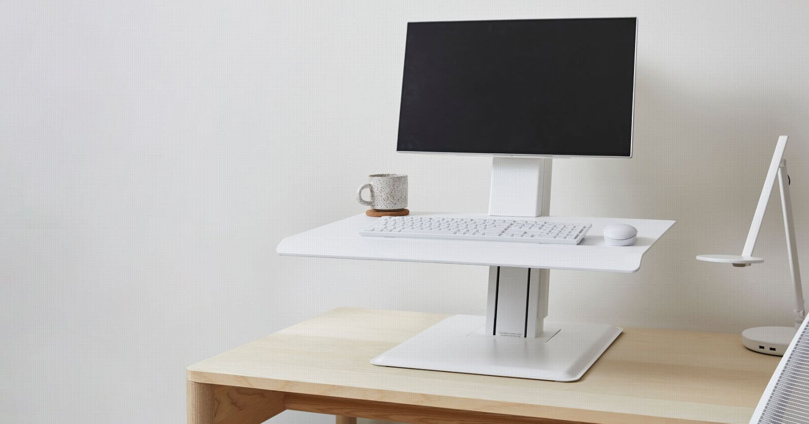 How to Choose a Standing Desk Converter for Your Existing Desk | Humanscale